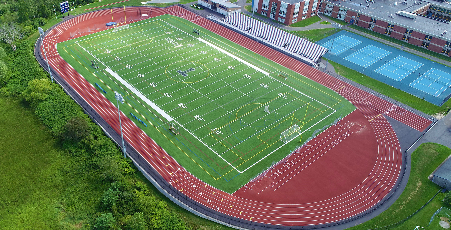 Learn About Running Track and Tennis Court Design & Maintenance ...